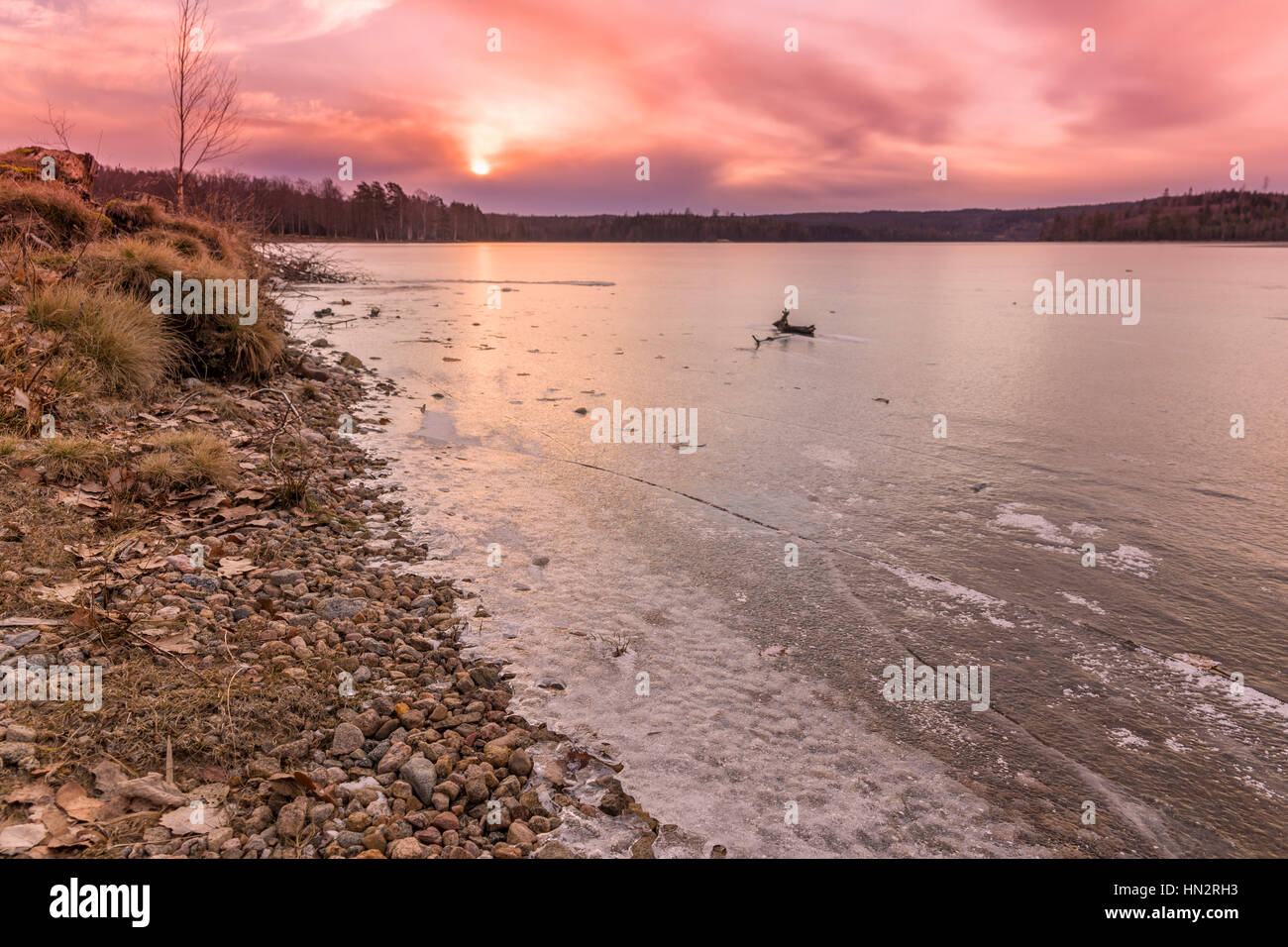 Ice covered lake at sunrise hi-res stock photography and images - Alamy