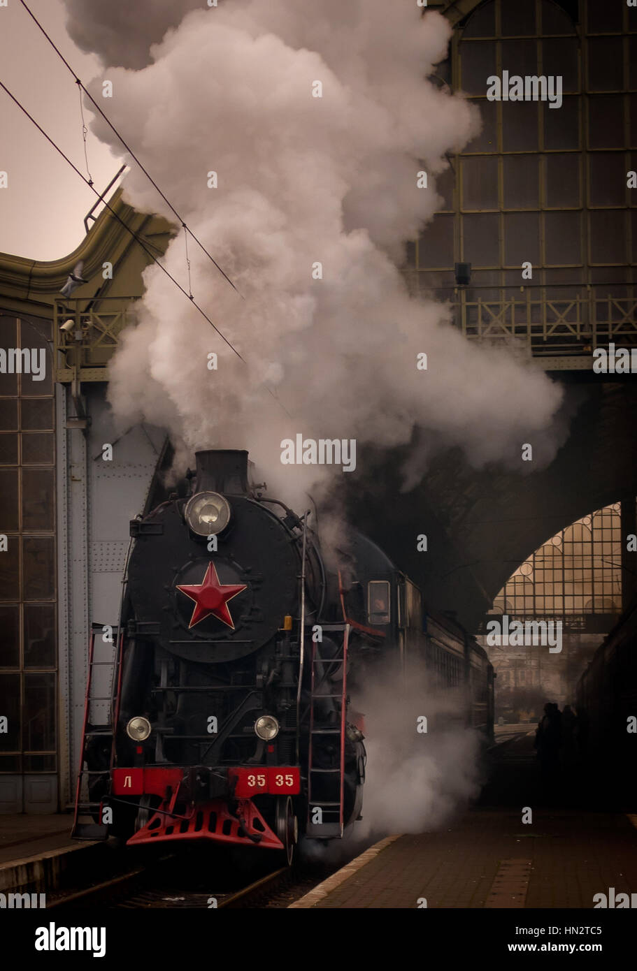 Old steam locomotive go to the route - Ukraine, Lviv Stock Photo - Alamy