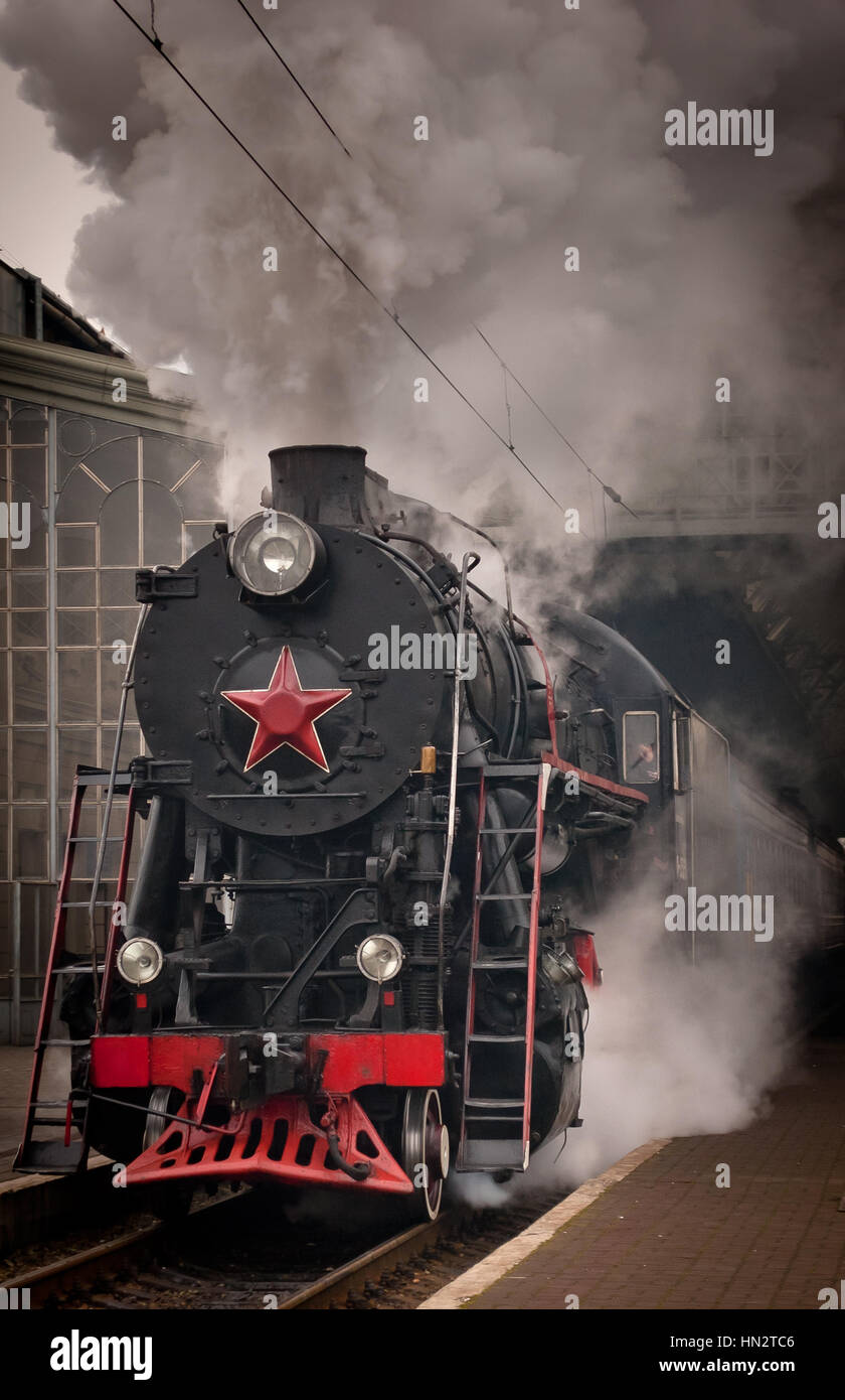 Old steam locomotive go to the route - Ukraine, Lviv Stock Photo - Alamy