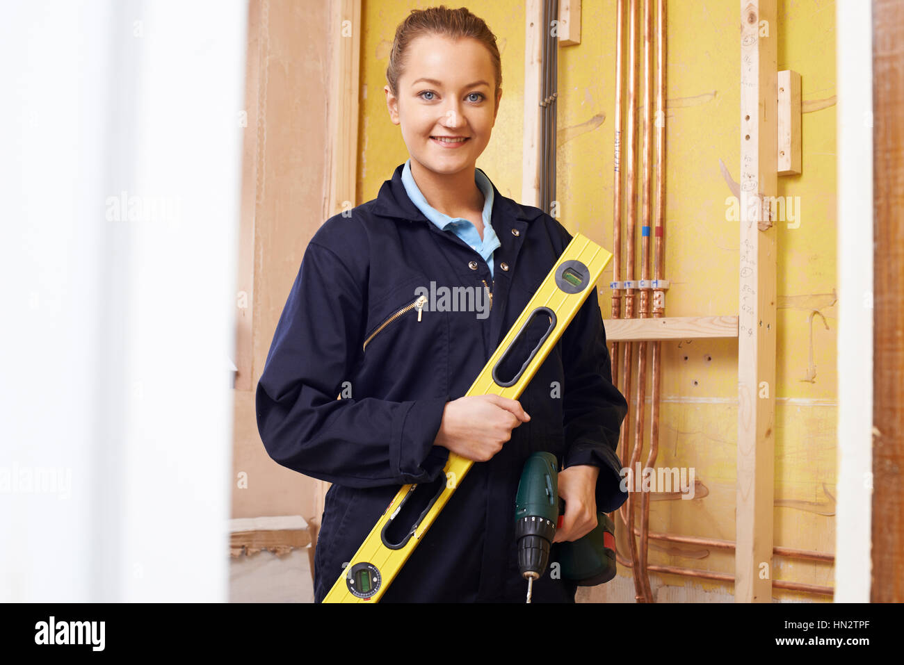 Female construction worker drill hi-res stock photography and images ...