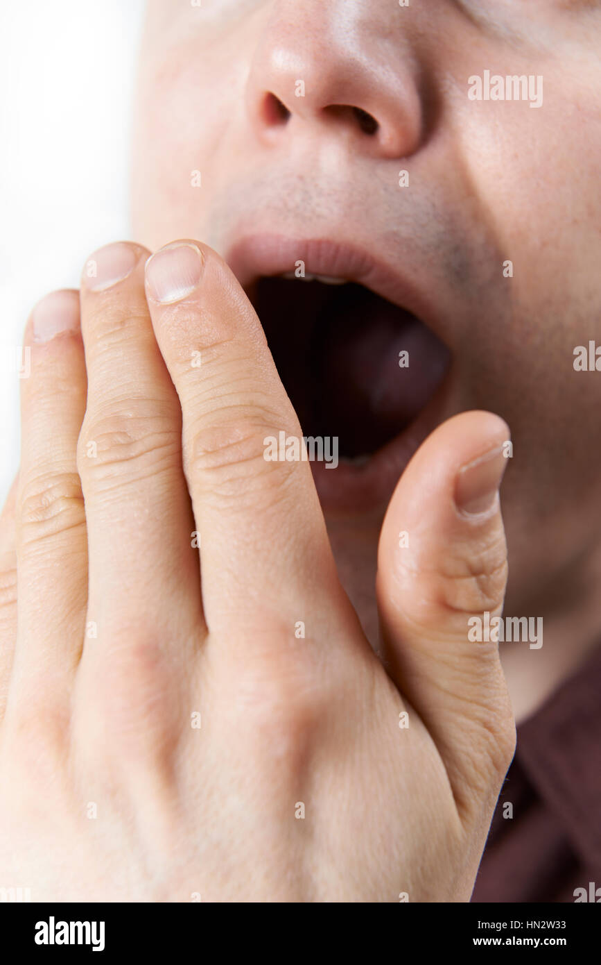 Men yawning hi-res stock photography and images - Alamy