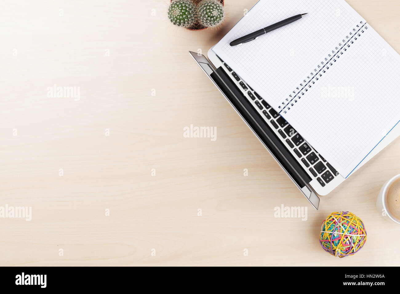 Office desk workplace with laptop, coffee and notepad on wooden ...