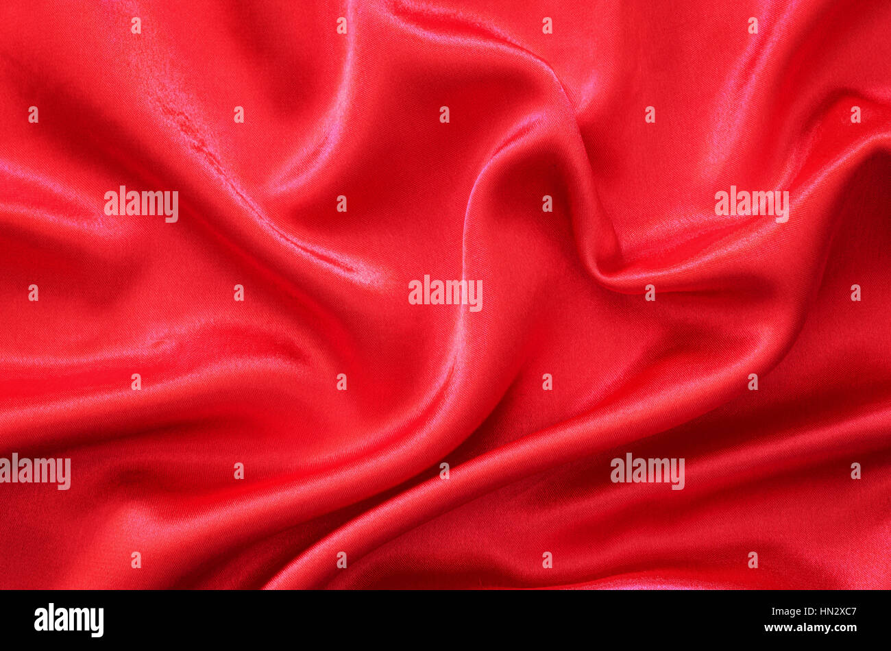 Red silk fabric draped in the form of heart for Valentine's day ...