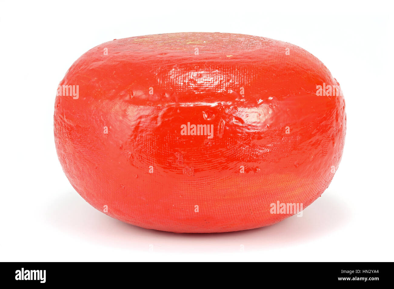 Edam cheese wheel isolated on white background Stock Photo - Alamy