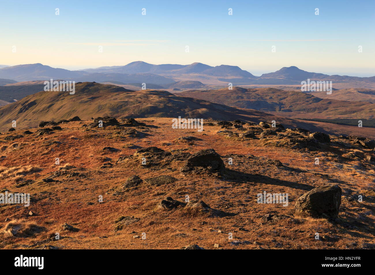 A hazy view of the Rhinog mountains viewed from Arenig Fawr Stock Photo ...