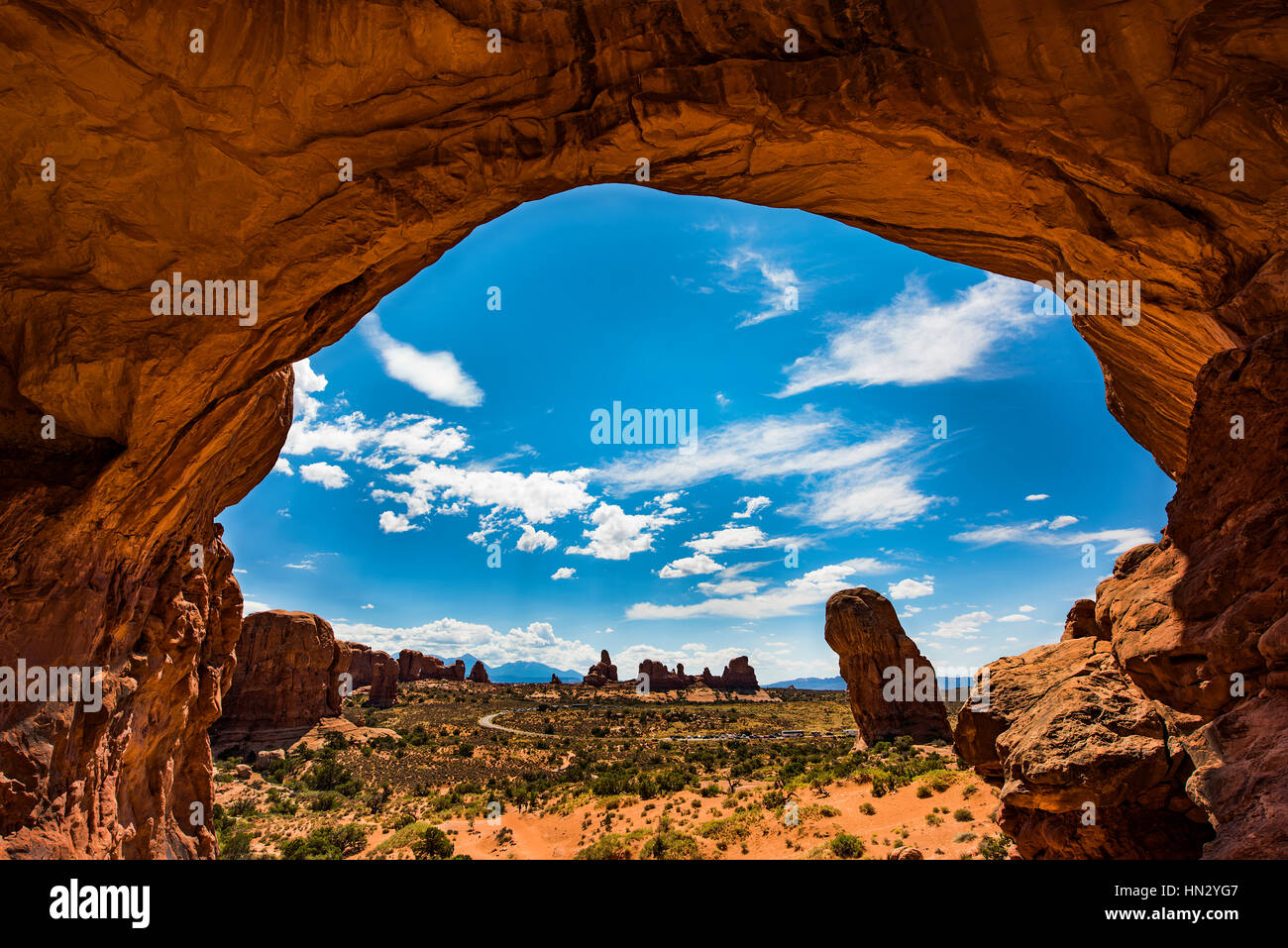 A valley view through Double Arch in Arches National Park, Utah Stock ...