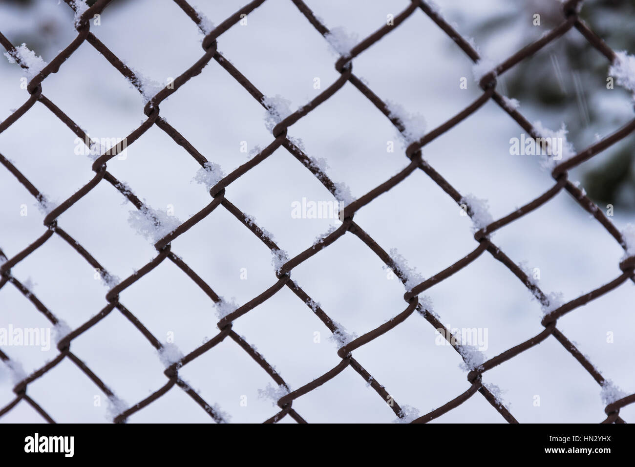 Winter snow fencing, building security, winter texture Stock Photo - Alamy