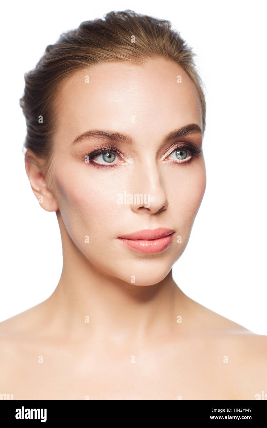 beautiful young woman face over white background Stock Photo - Alamy