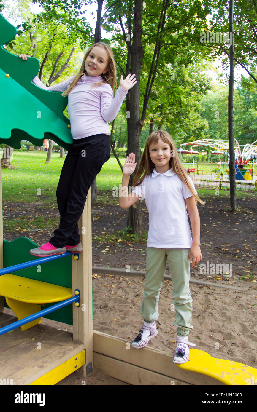 Photo of two playing girls in summer Stock Photo - Alamy