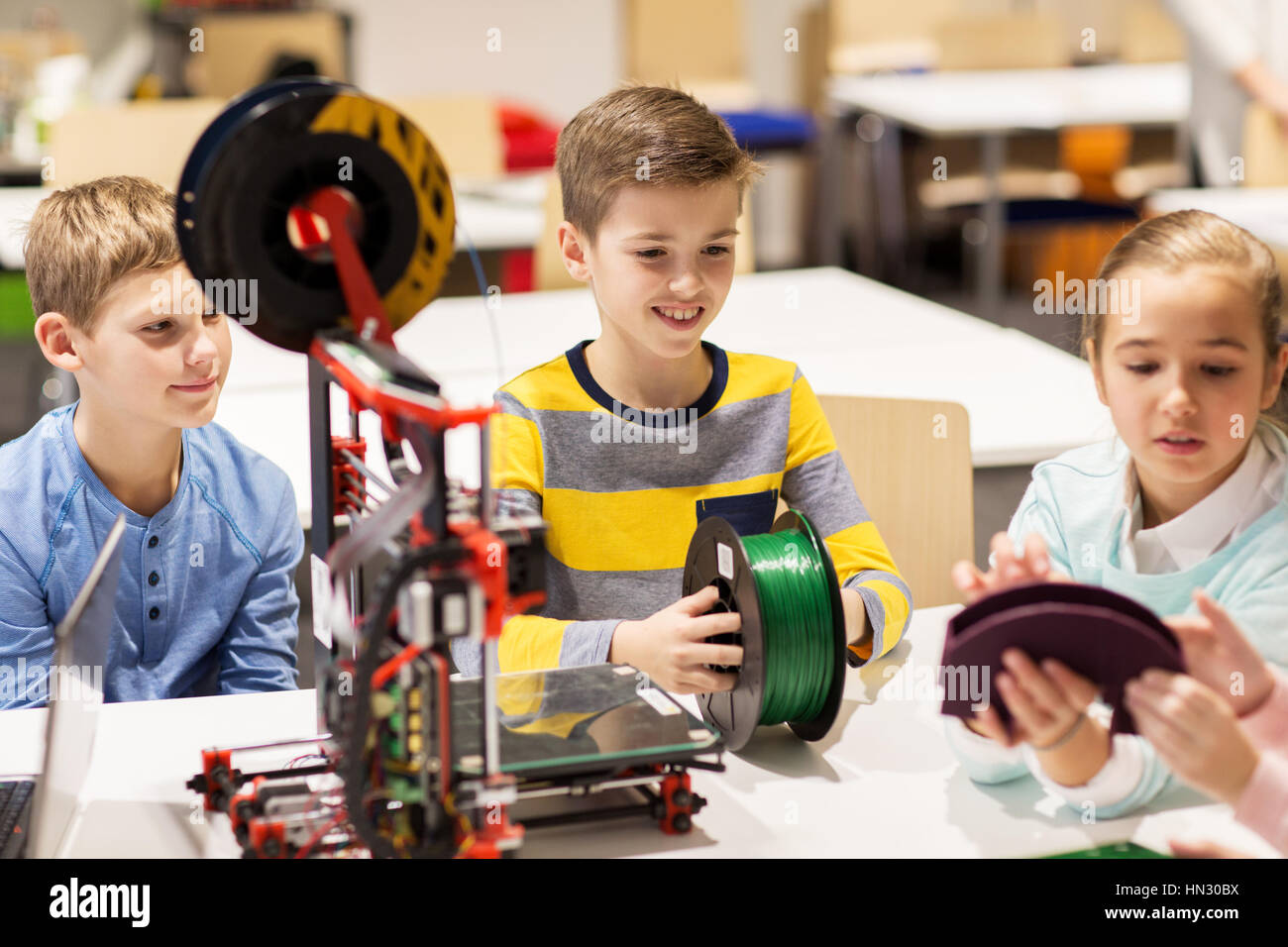 happy children with 3d printer at robotics school Stock Photo - Alamy