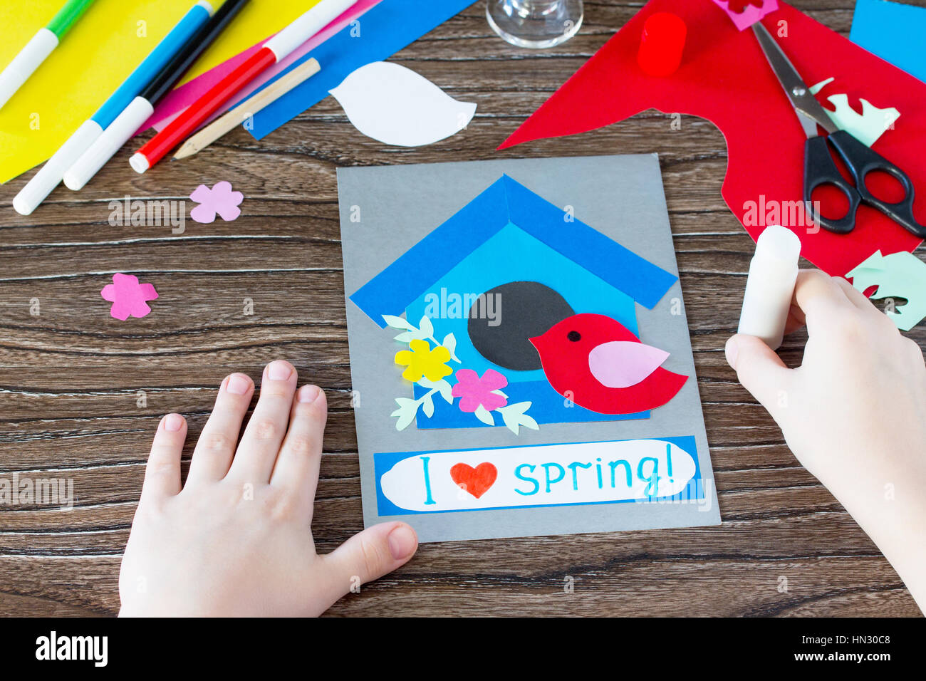 The child create a spring greeting card paper bird and birdhouse. Made ...