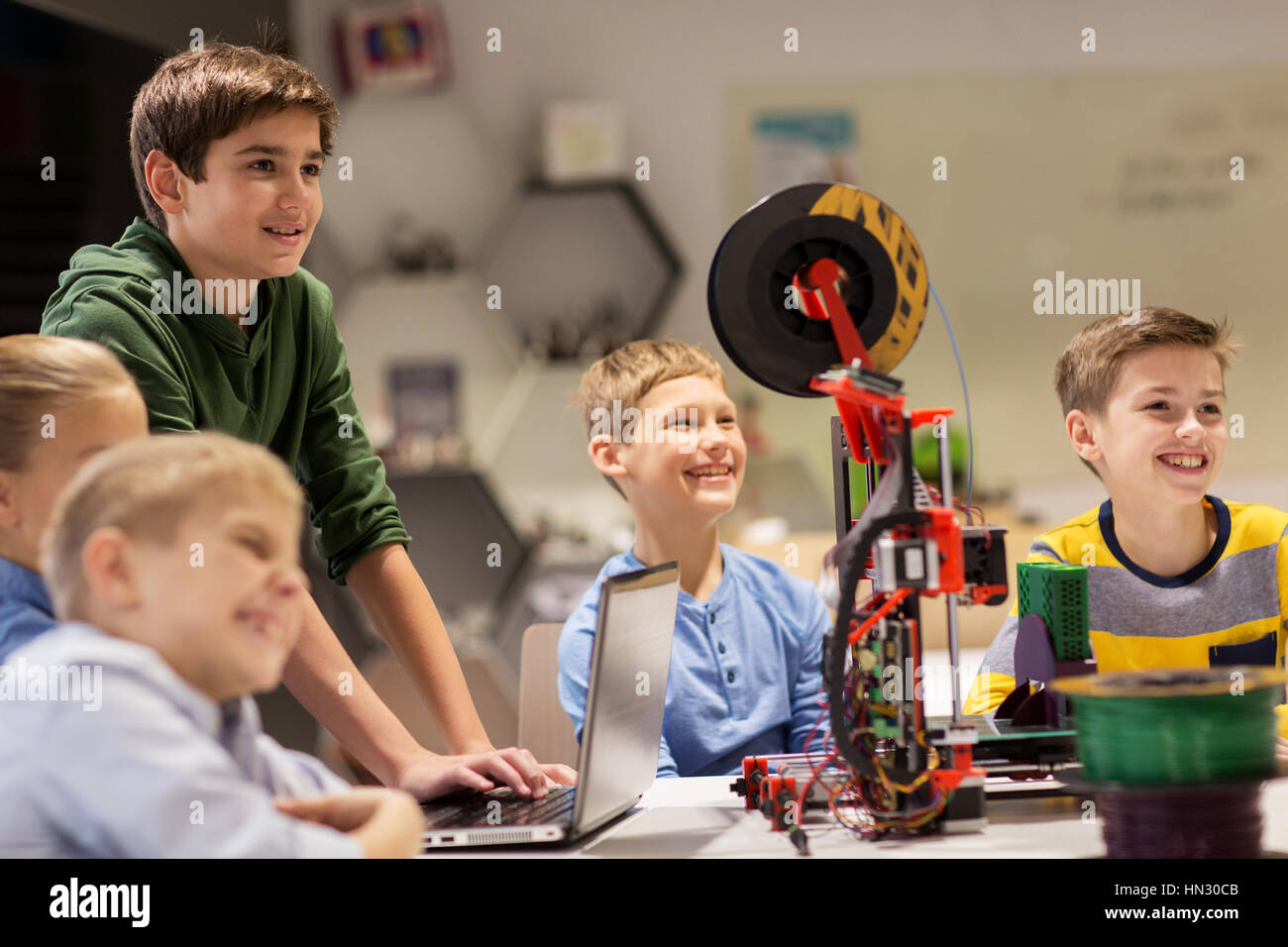 happy children with 3d printer at robotics school Stock Photo - Alamy