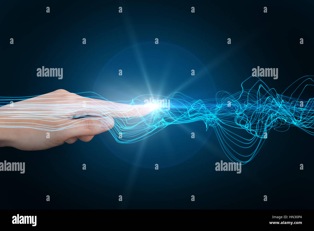 Hand pointing against futuristic glowing lines on black and blue ...