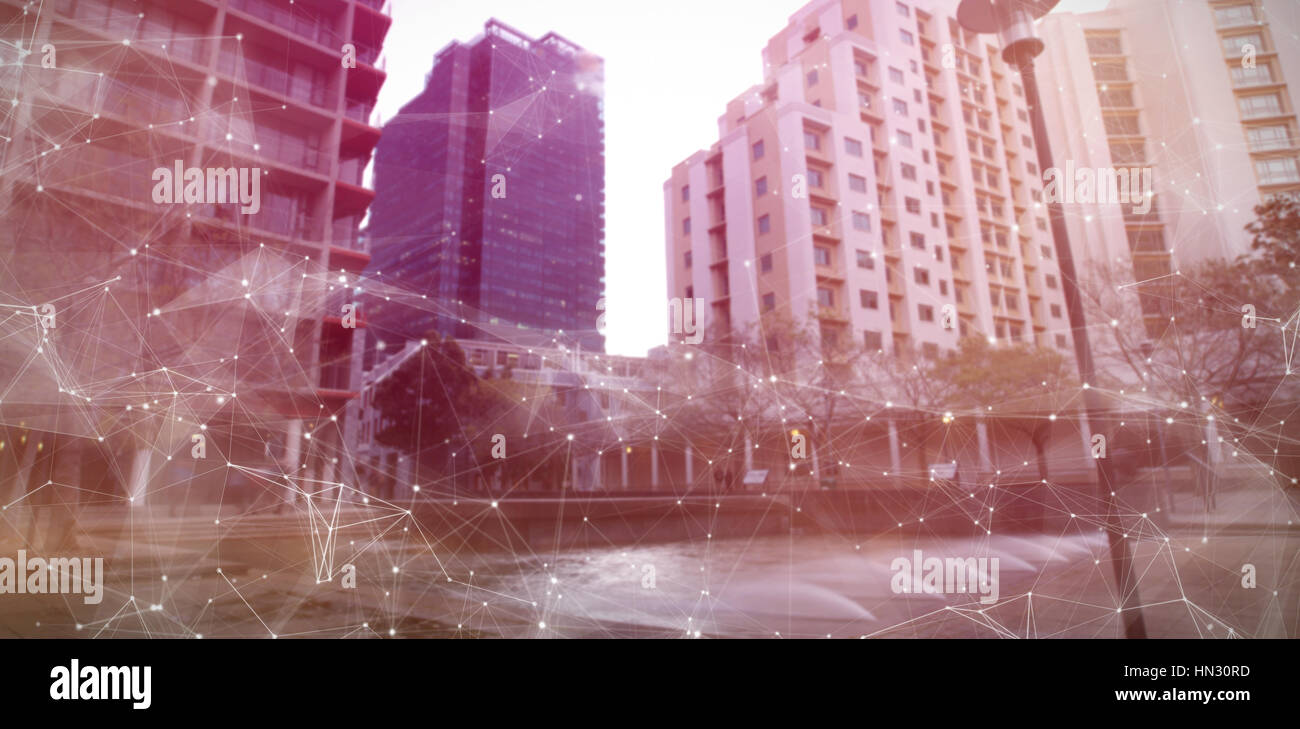 Constellation between stars against buildings against sky on sunny day ...