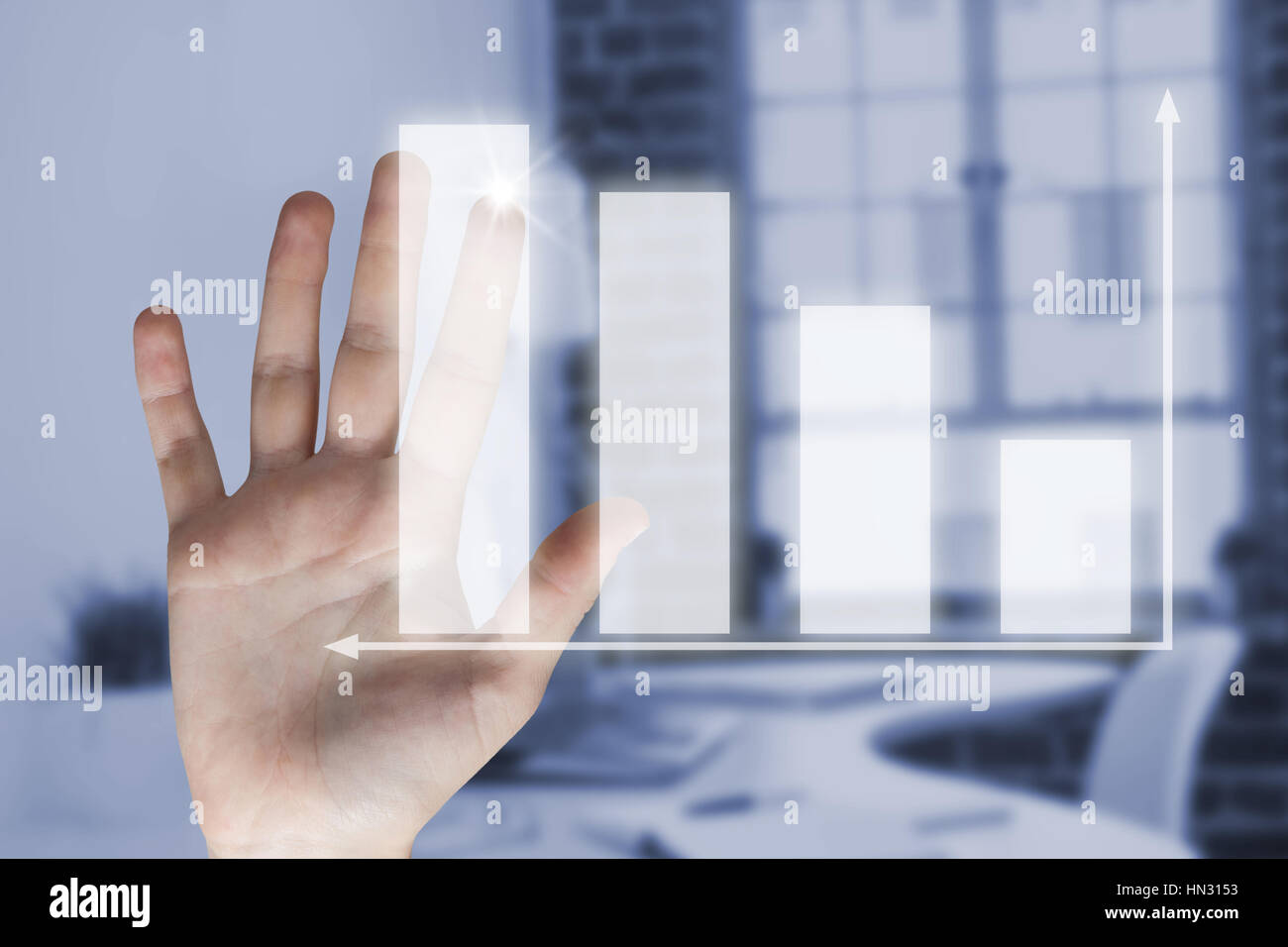 Hand of woman touching invisible screen against laptop on desk with ...