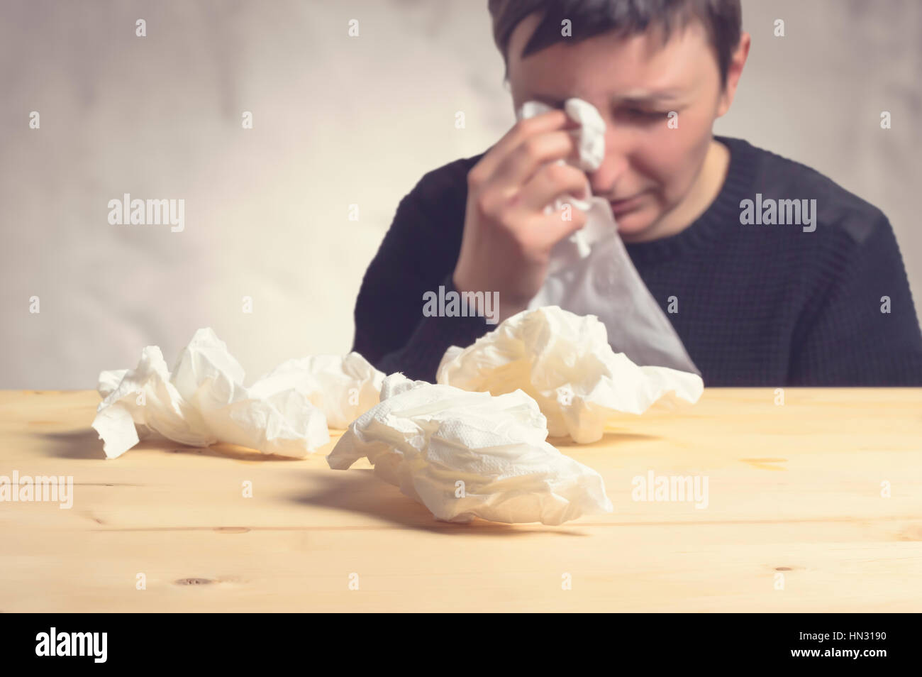 Wiping her tears hi-res stock photography and images - Alamy