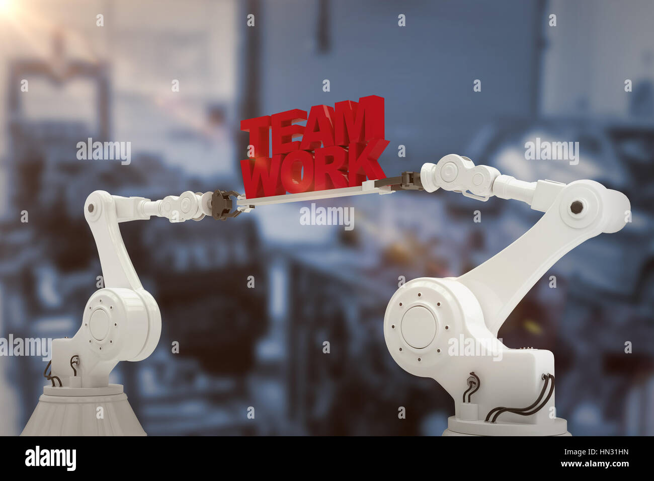 Mechanical hands holding team work message on white background against ...