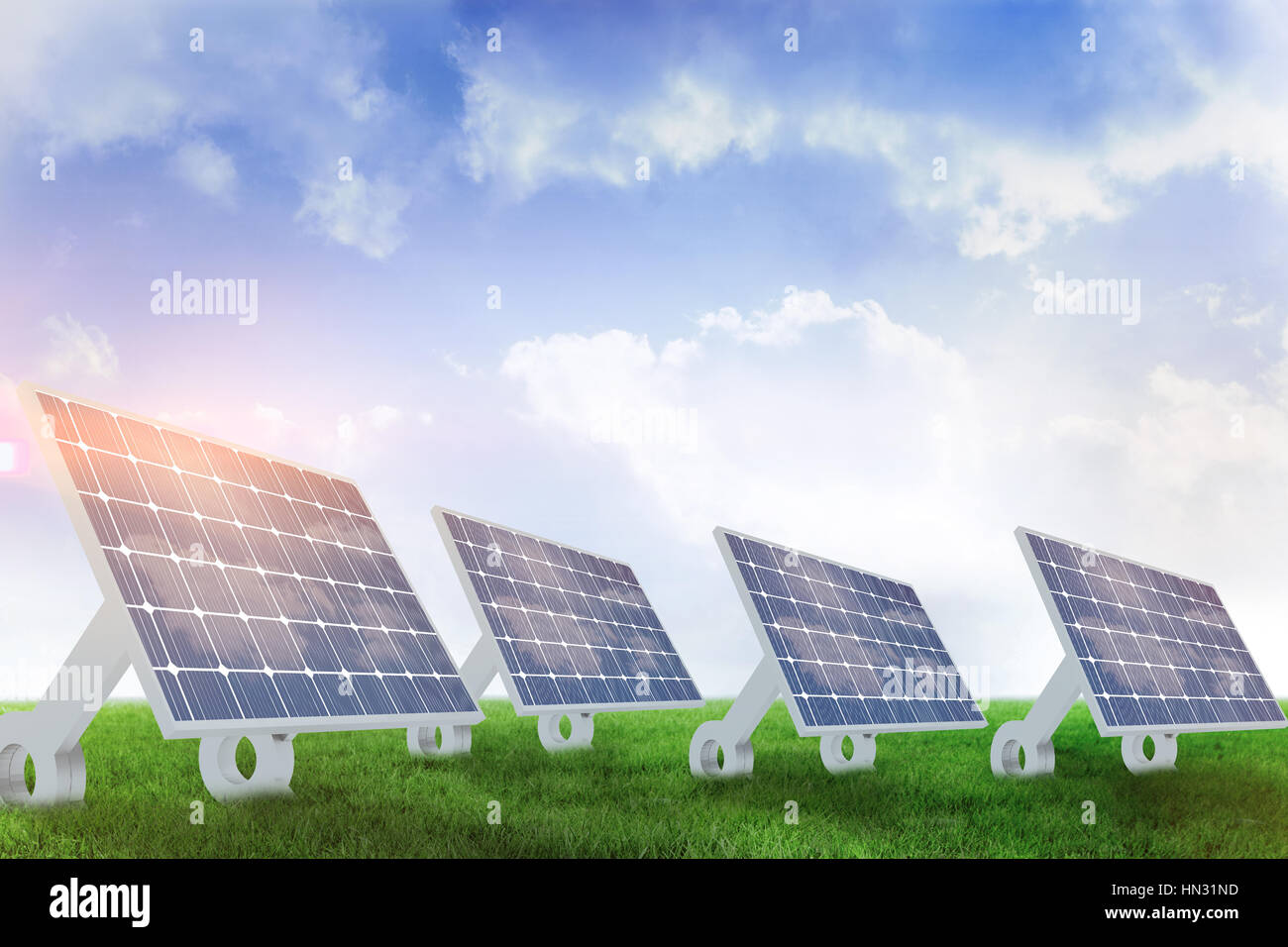 Sources of renewable energy equipment against blue sky over green field ...