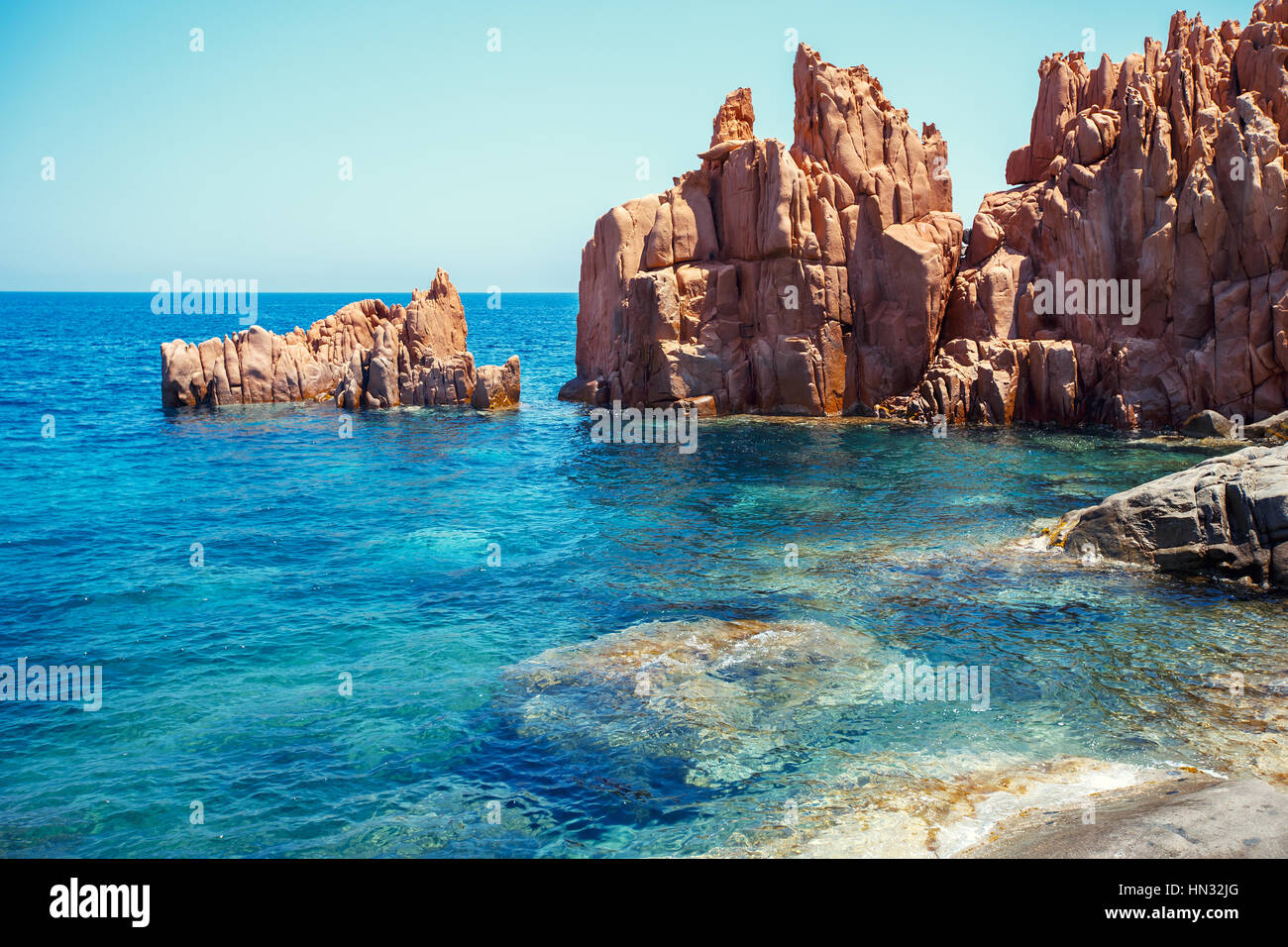 Red rocks and turquoise water of Arbatax, Sardinia Stock Photo - Alamy