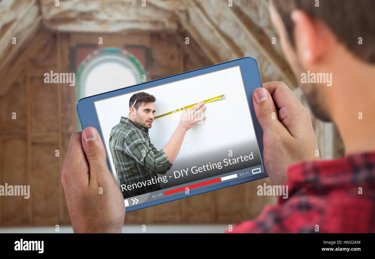 Man using tablet against cropped image of person holding tablet Stock ...