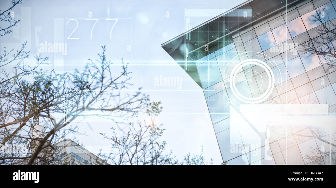 Black technology design with glow against trees and building against ...