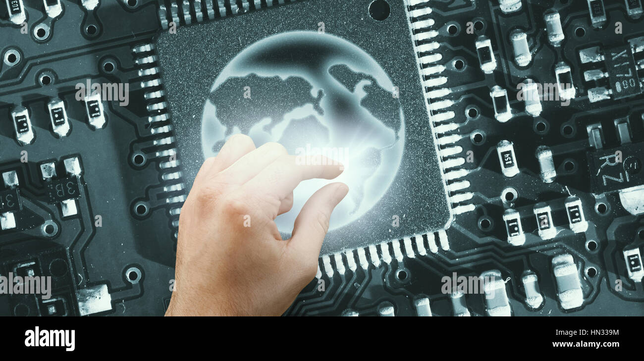 Hand showing against blue micro electronic circuit Stock Photo - Alamy