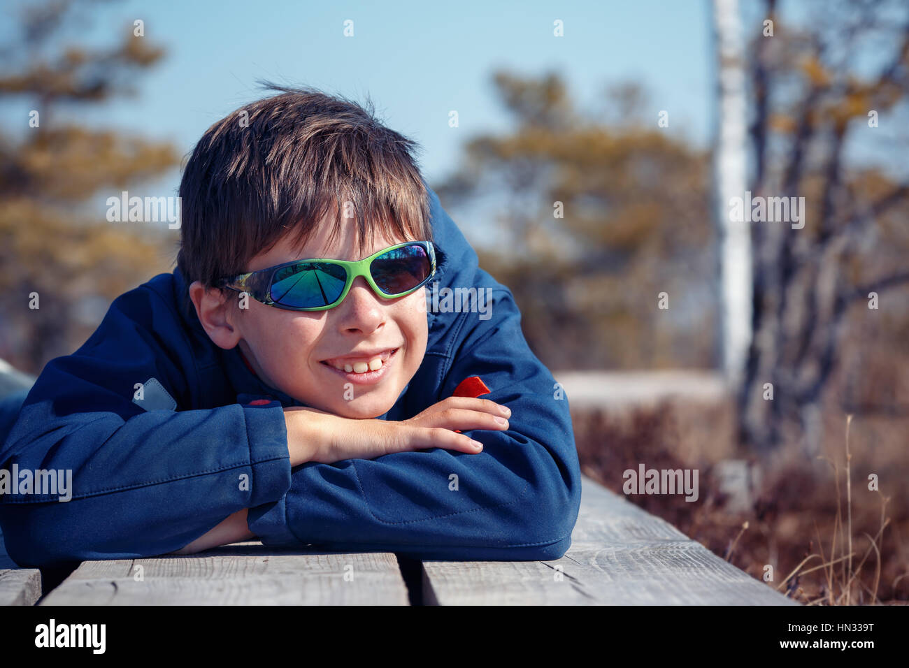 Cute little boy having rest outdoors on beautiful spring day Stock ...