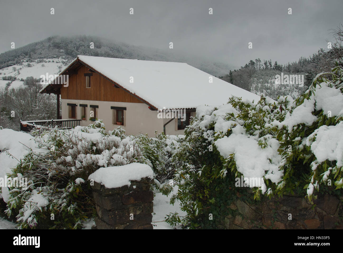 Basque farmhouse in winter with snow Stock Photo - Alamy