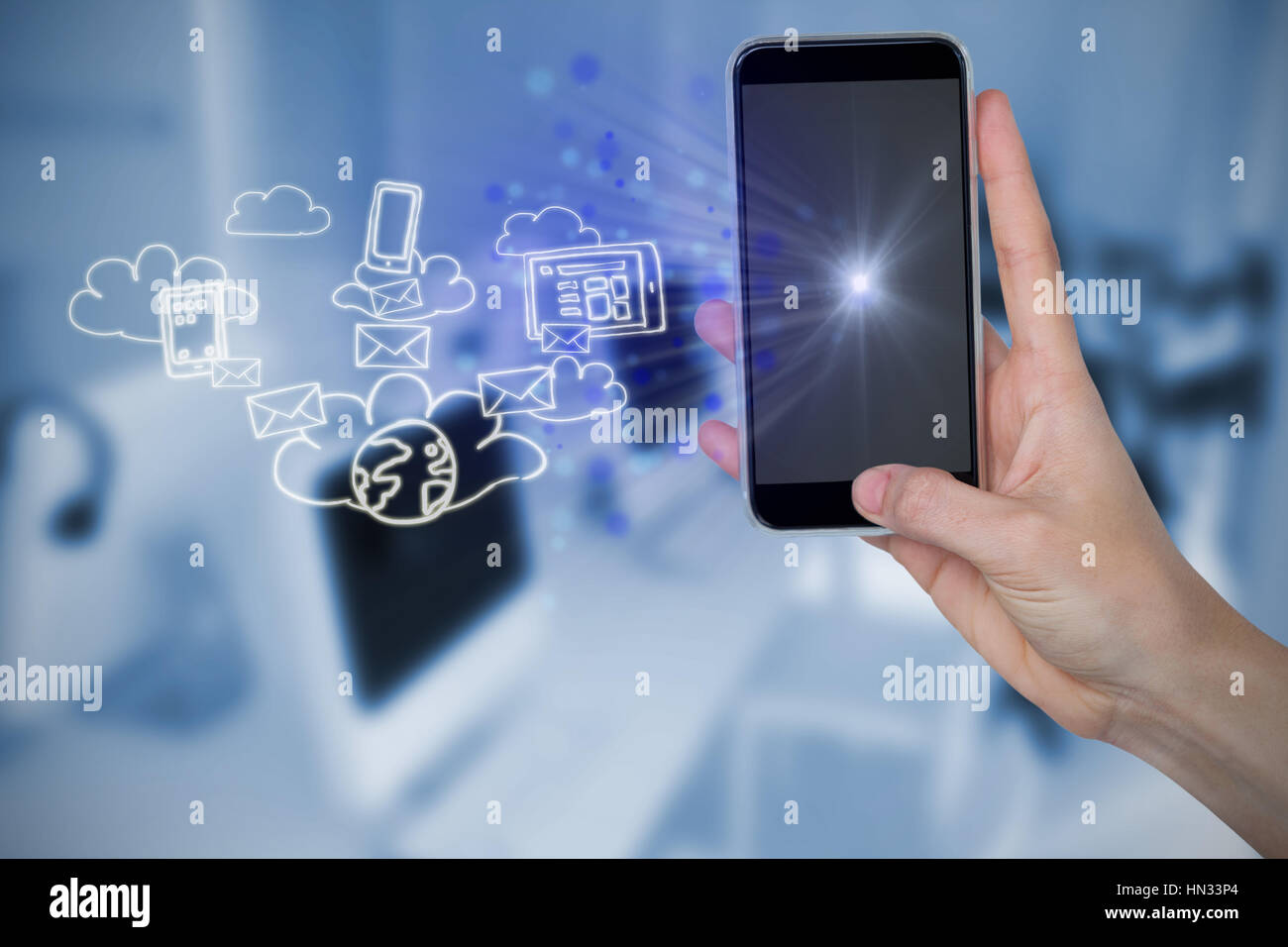 Human hand holding mobile phone against white background against ...