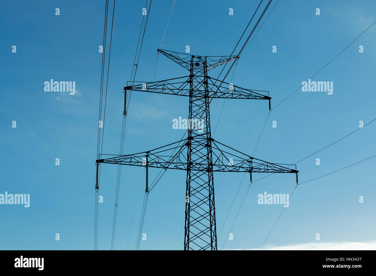 High voltage pylon on skies background, Transmission line tower in ...