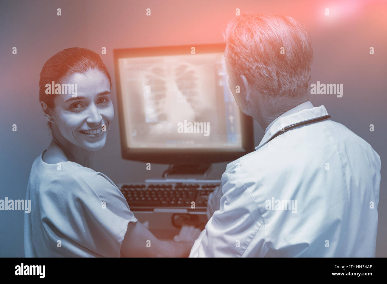 Xray of human chest on digital surface against doctor and nurse ...