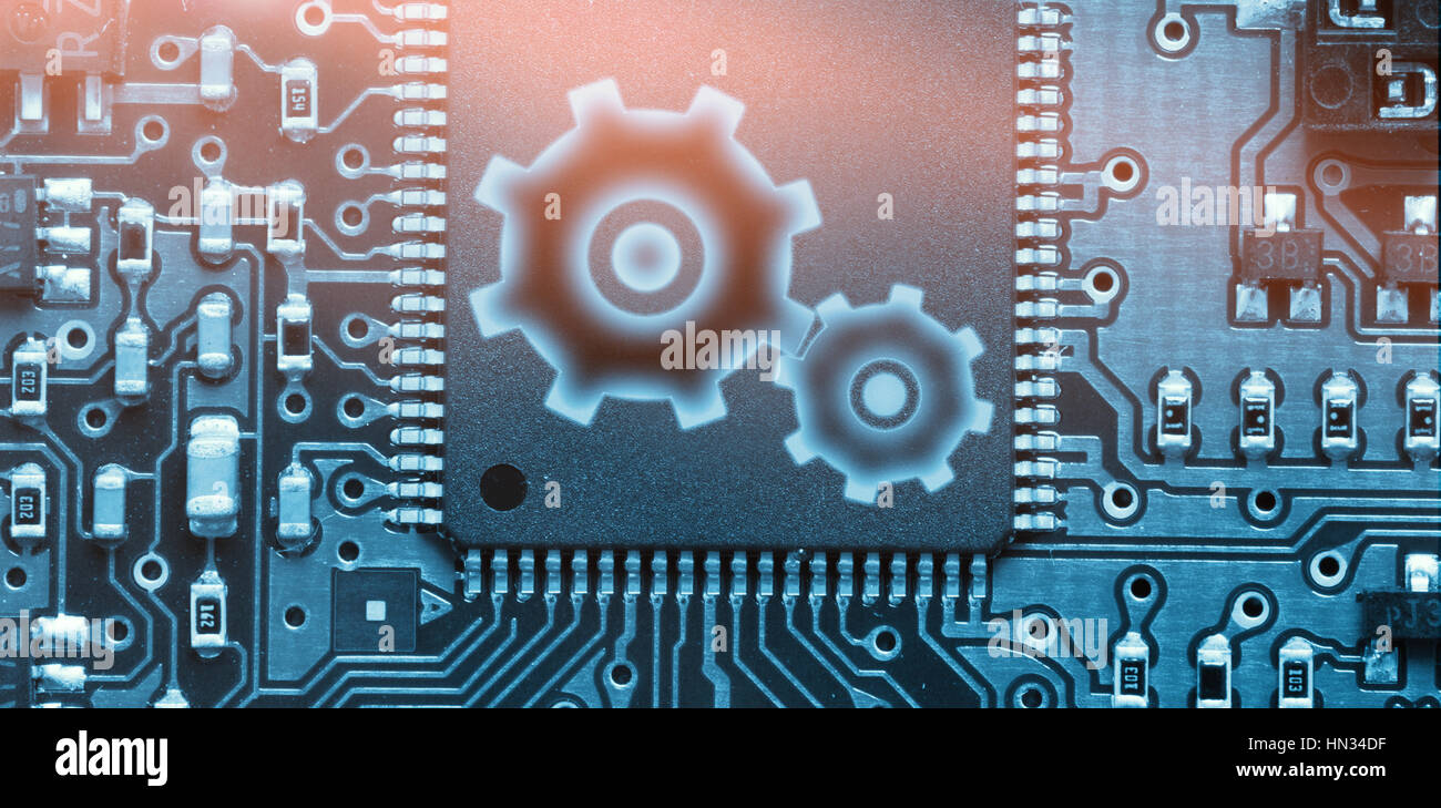 Cog and wheel against blue electronic circuit Stock Photo - Alamy