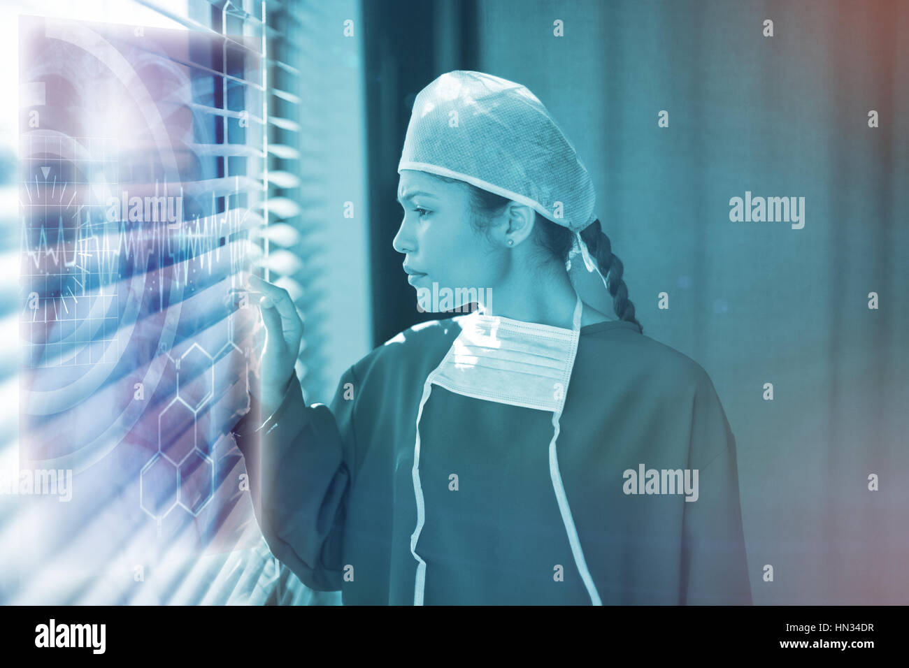 Surgeon looking through window hi-res stock photography and images - Alamy