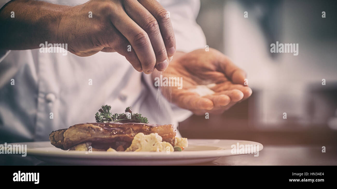 Putting salt hi-res stock photography and images - Alamy