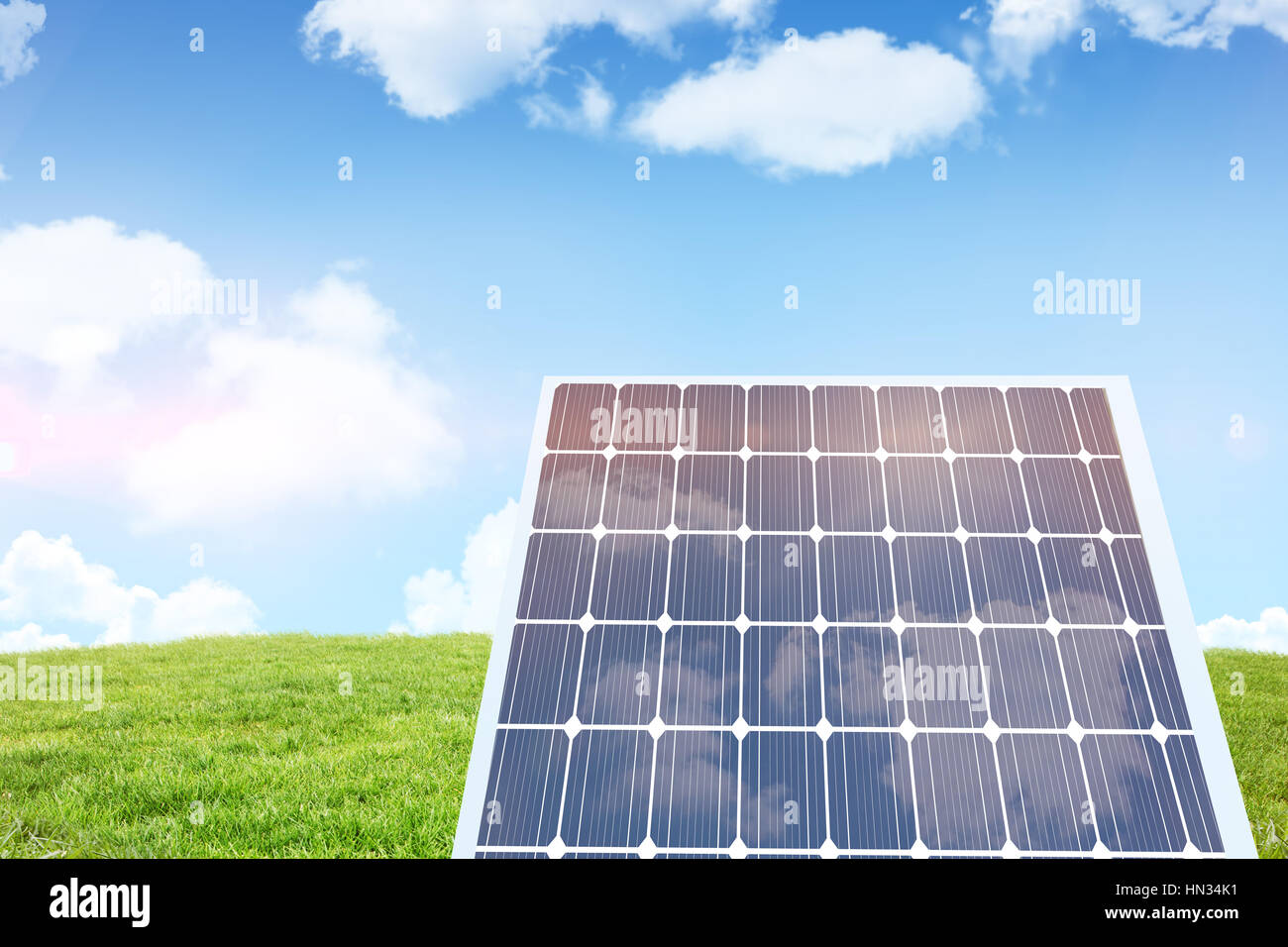Hexagon solar panel equipment against blue sky over green field Stock ...