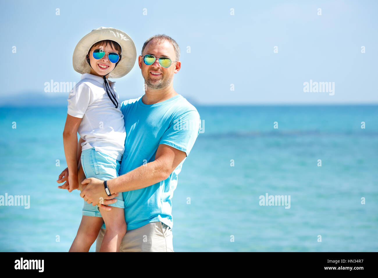 Happy father and his cute little son outdoors Stock Photo - Alamy
