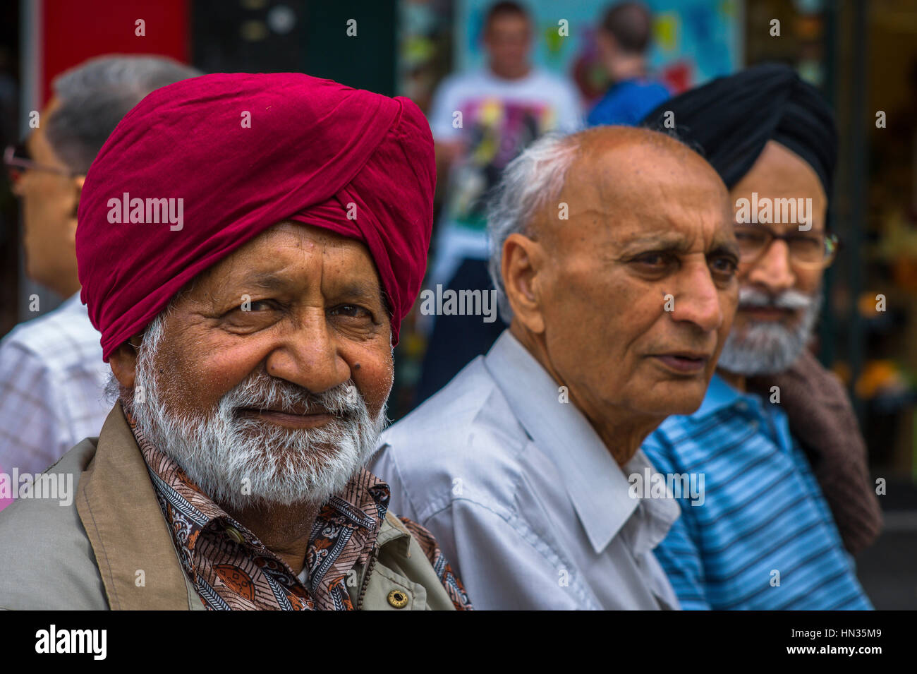 A Sikh gentleman with friends in multicultural Leicester Stock Photo ...