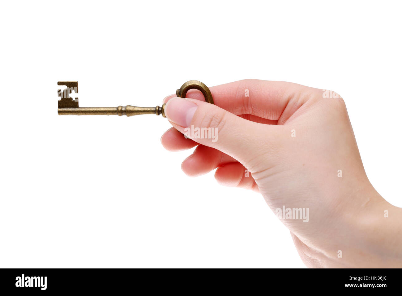 Hand holding antique key isolated on white background Stock Photo - Alamy