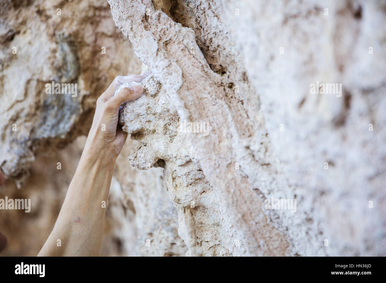 Close up of climber's hand on cliff Stock Photo - Alamy