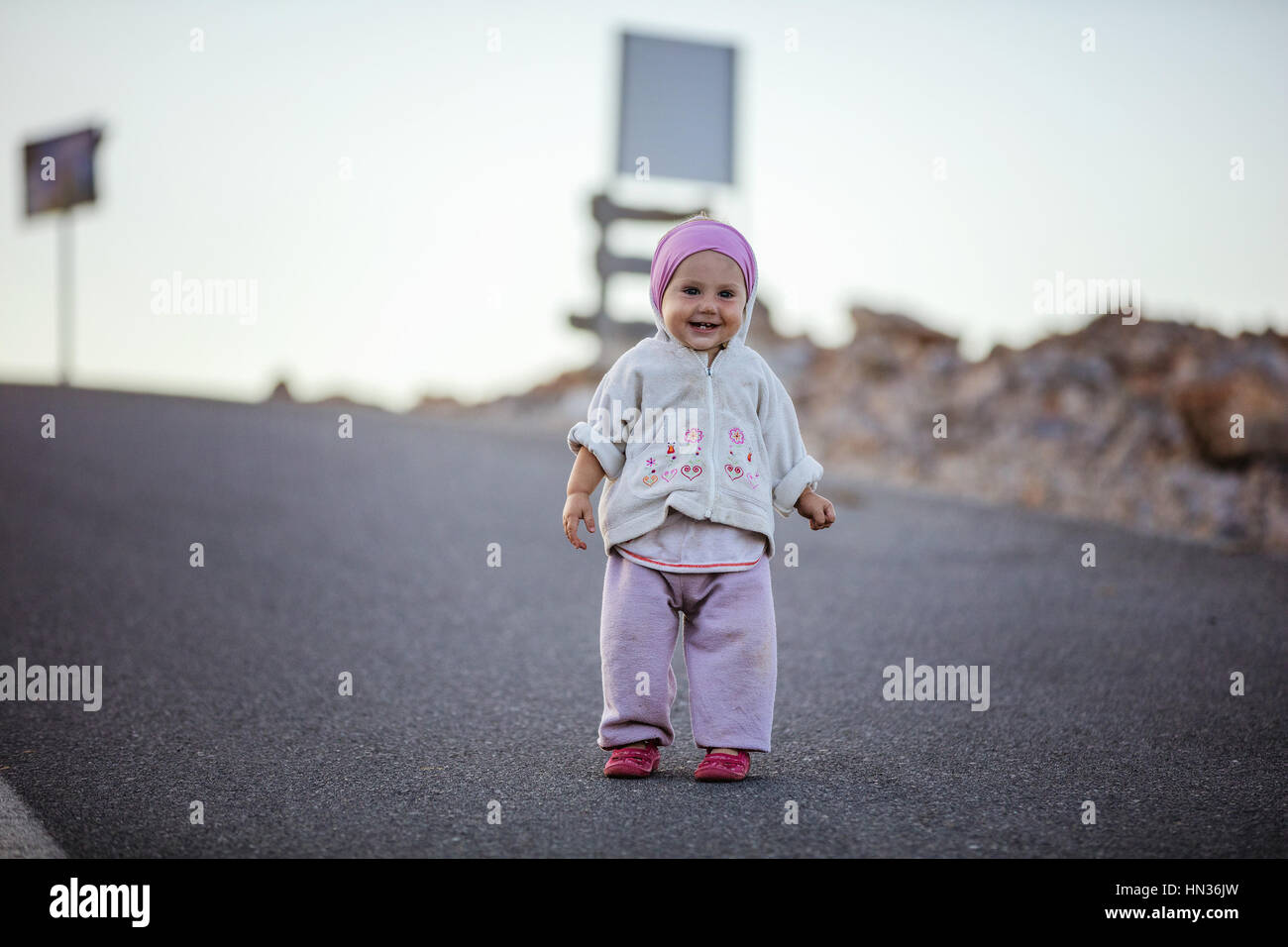 Girl standing on road hi-res stock photography and images - Alamy