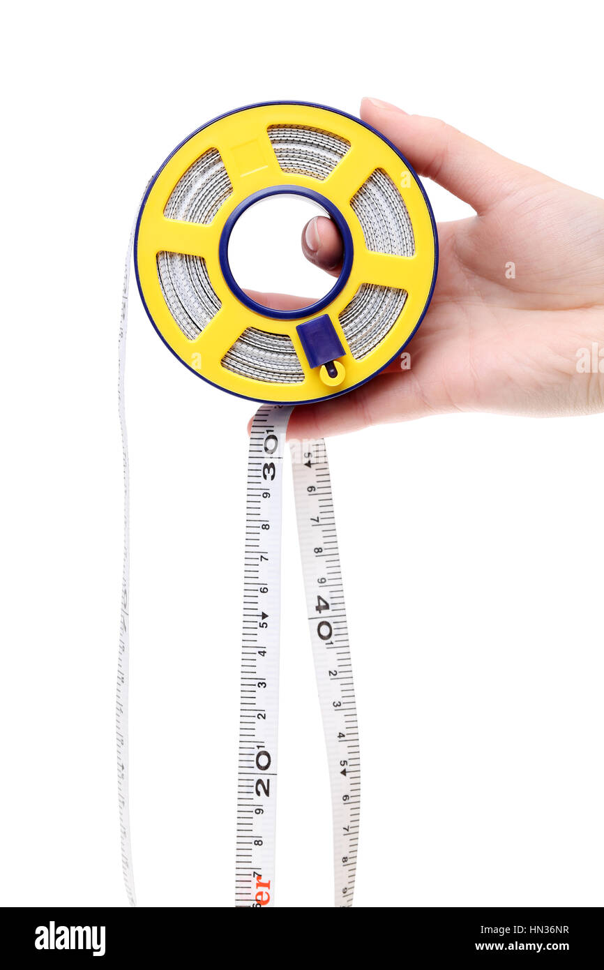 Hand holding measure tape isolated on white background Stock Photo - Alamy
