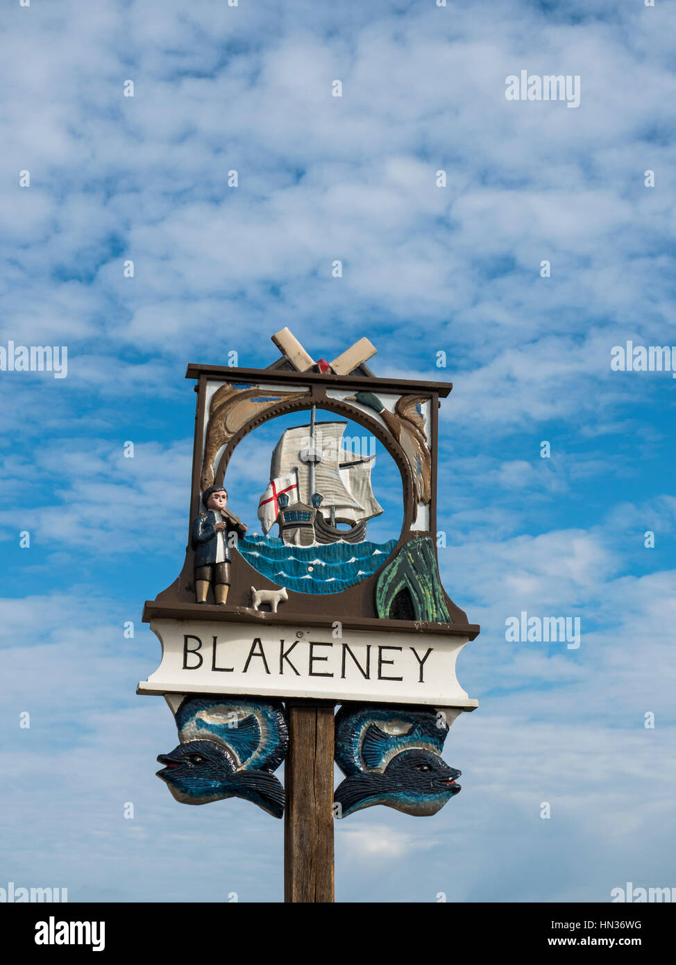 Wooden village sign at Blakeney Stock Photo - Alamy
