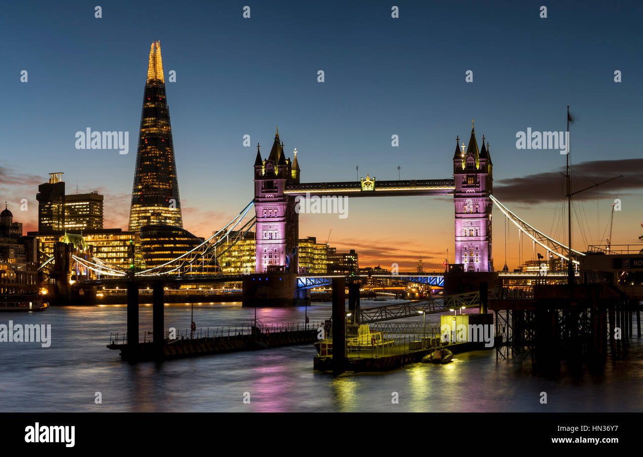 A view of the Thames at night including Tower Bridge and The Shard ...