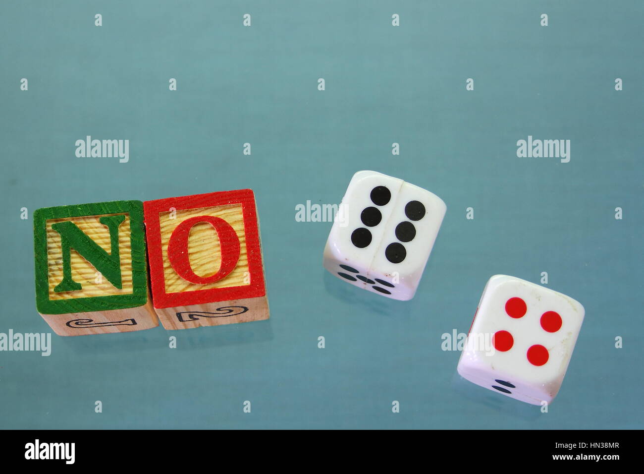 The term no-dice displayed on a clear blue background using colorful ...