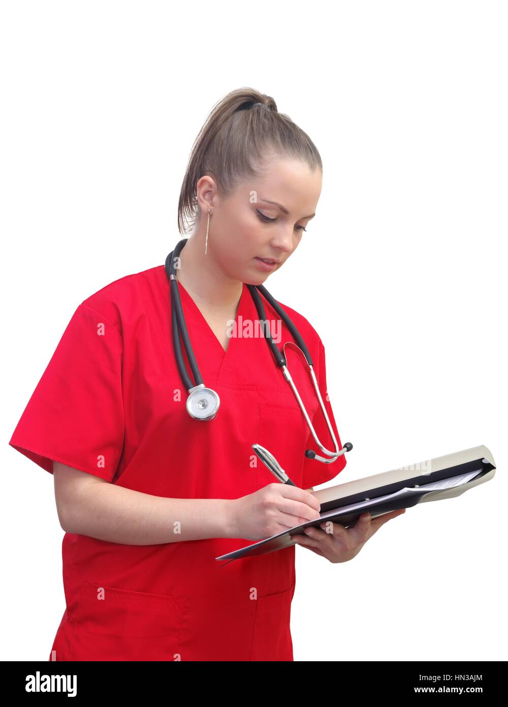 Portrait of confident female doctor signing the document Stock Photo ...