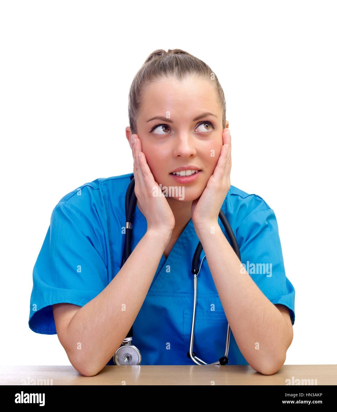 Close-up of a female doctor thinking in an office Stock Photo - Alamy
