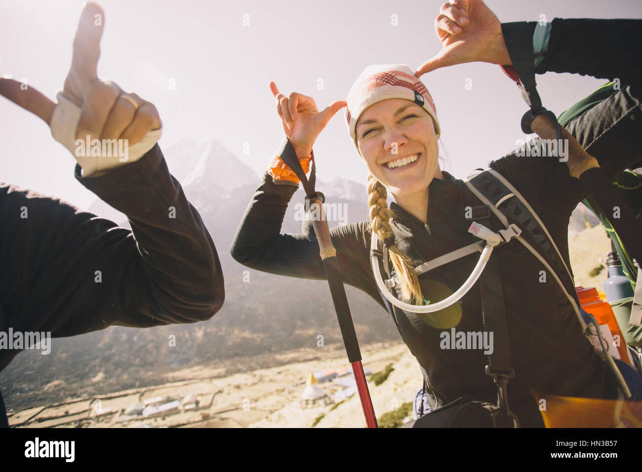 A Woman And Her Sherpa Guide Joke Around On The Trail In The Everest ...
