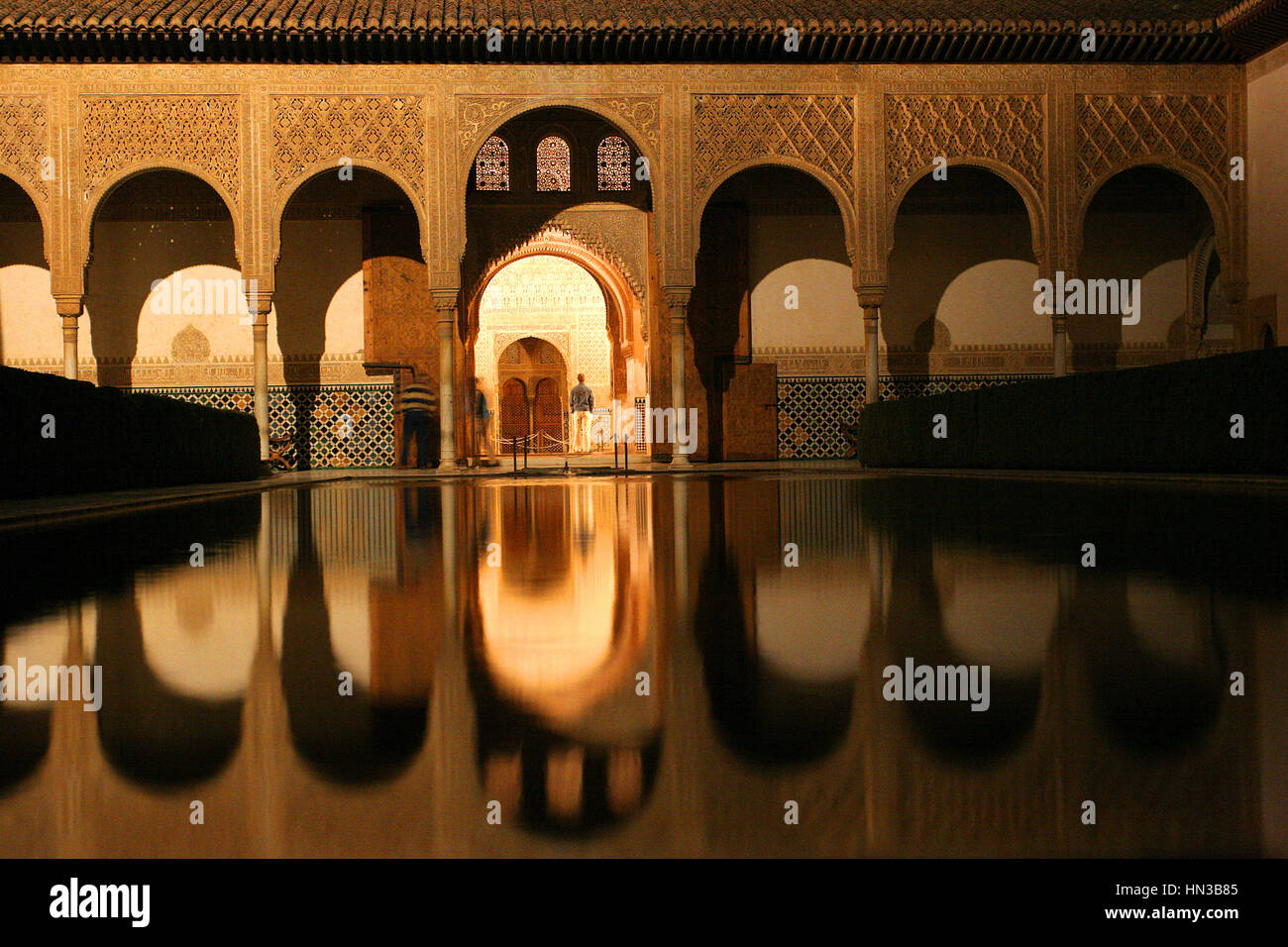 Reflection Of Alhambra Palace In A Pool In Granada, Spain Stock Photo ...