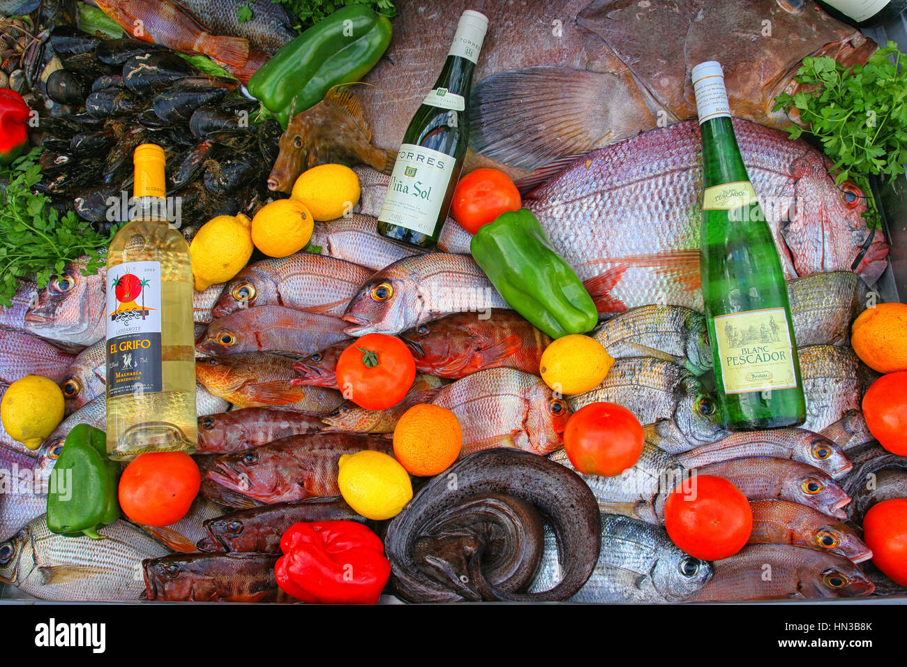 High Angle View Of Platter Of Locally Caught Fresh Fish With Wine ...