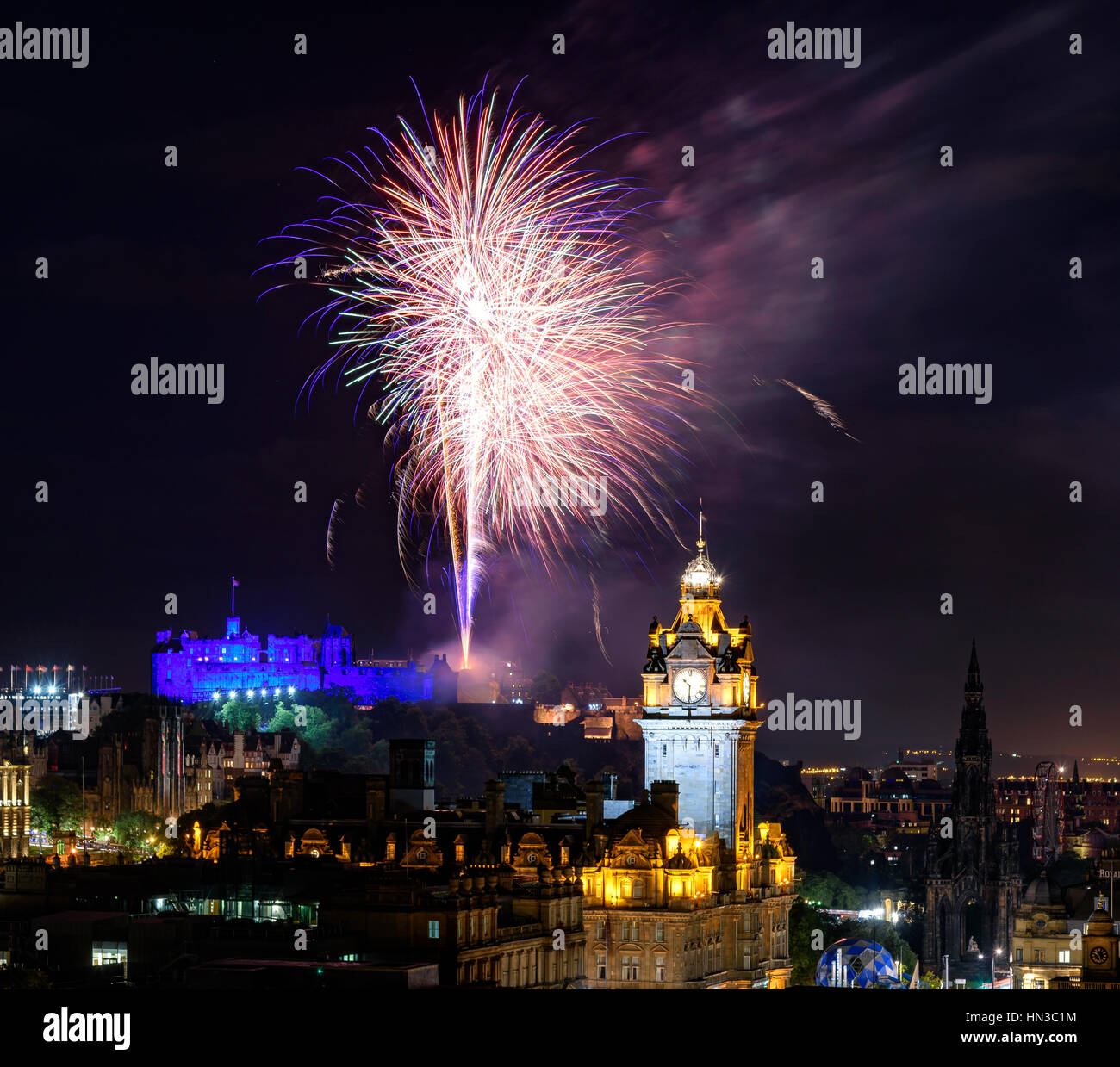 Edinburgh Cityscape with fireworks over The Castle and Balmoral Clock ...